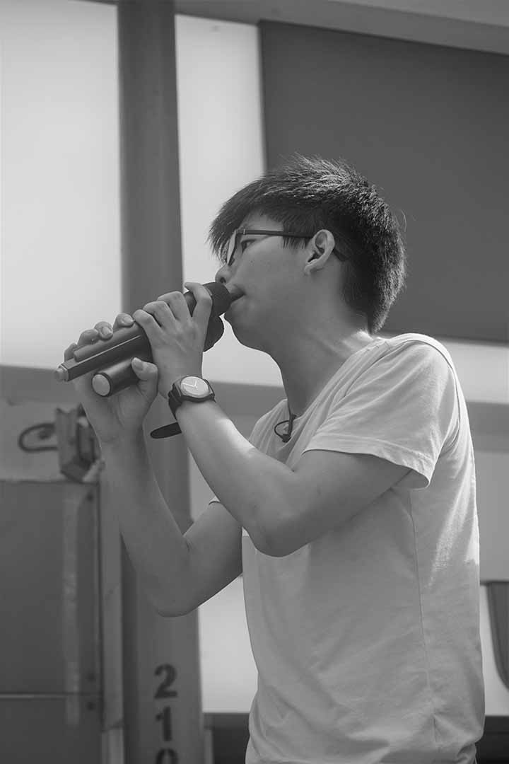 Joshua Wong addressing demonstrators at the annual protest march, Yee ...