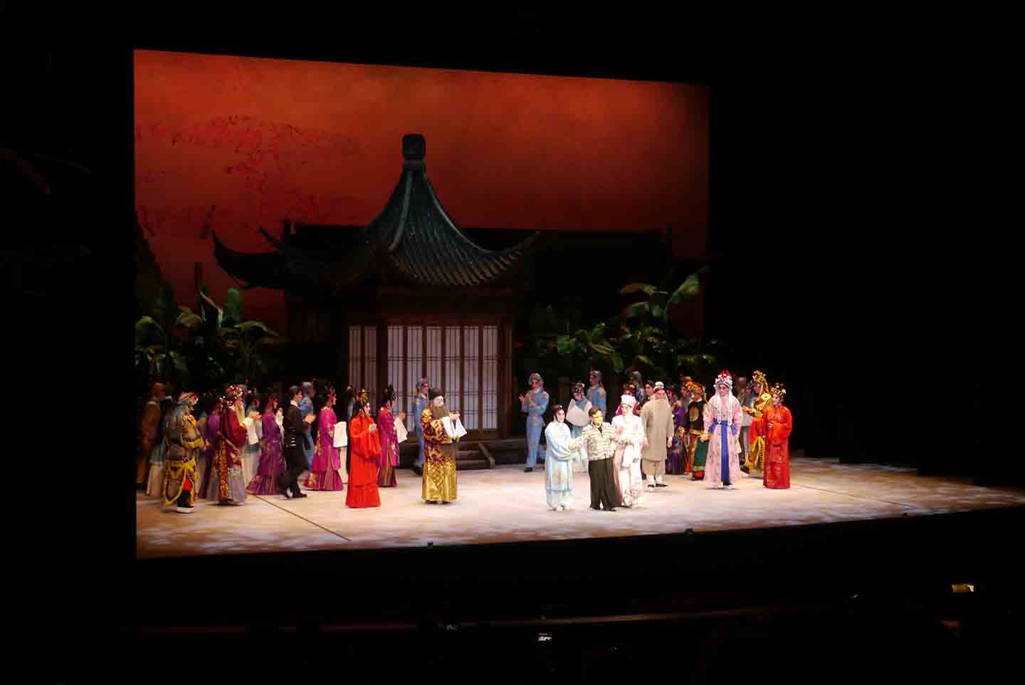 Performers taking their bows with artistic director Pak Suet-sin after ...